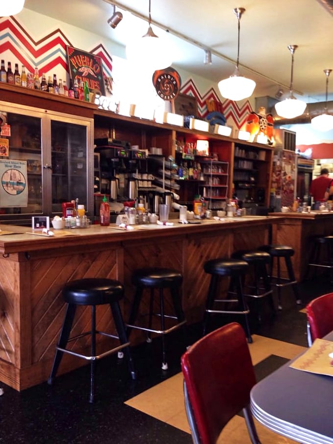 A bar that invites lingering conversations and "just one more" cups of coffee. The chevron pattern above practically winks at you.