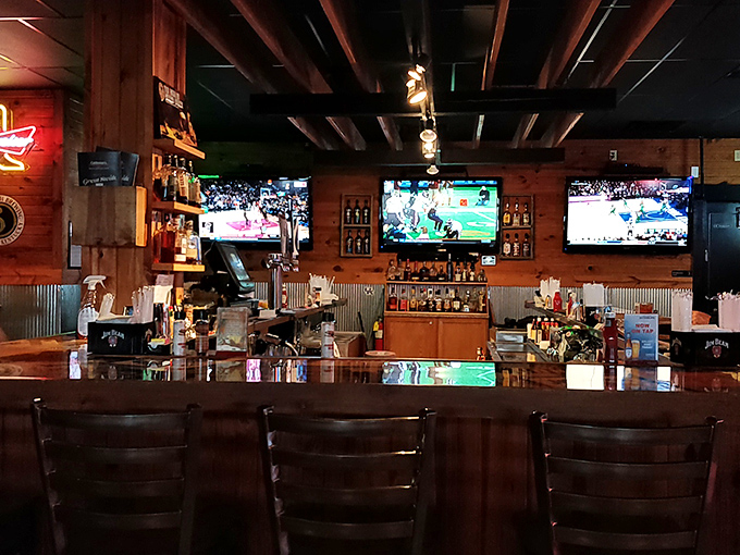 The bar area&mdash;where bourbon meets sports on multiple screens, creating that perfect trifecta of Kentucky pleasures.