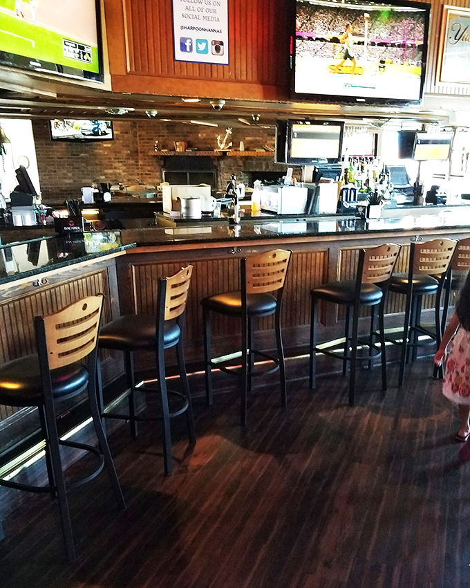 Bar seating that invites spontaneous friendship. Where solo diners become regulars and bartenders remember your usual after just two visits.