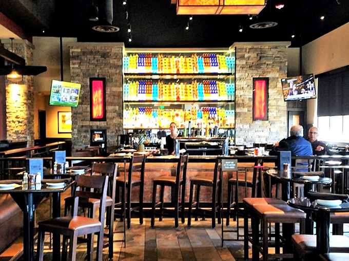 The colorful backlit bar doesn't just serve drinks &ndash; it creates conversation starters that last long after the glasses are empty.