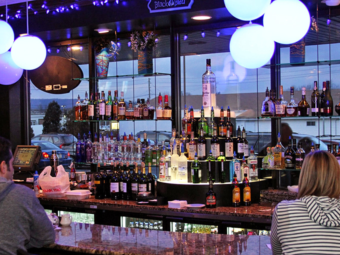 A bar that glows with possibility&mdash;each bottle a story waiting to be poured, each glass a memory in the making.