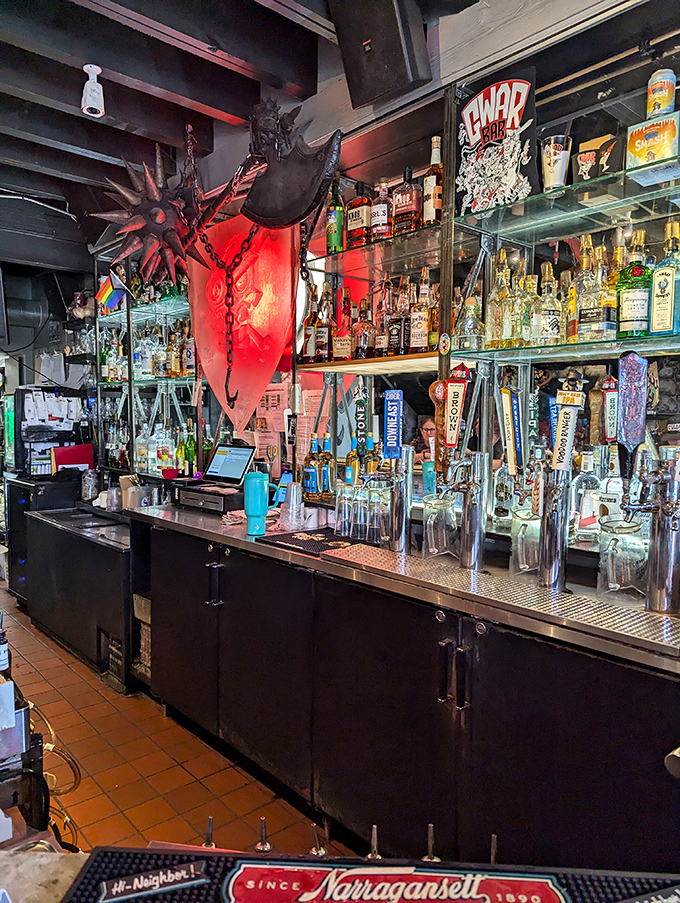 A bar well-stocked enough to help you forget you're drinking beneath dismembered mannequin parts.