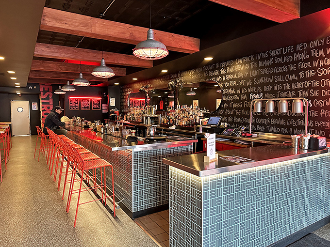 The bar area&mdash;where wood beams meet neon lights and the chalkboard wall tells stories of drinks past and future.