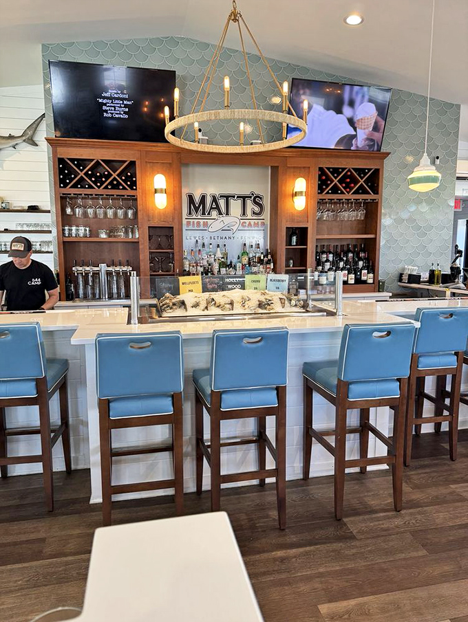 The bar at Matt's&mdash;where coastal elegance meets functional beauty. That fish-scale tile backsplash deserves its own design award while you sip something spectacular.
