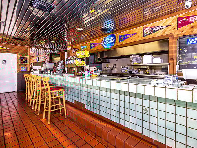 The counter where magic happens &ndash; a front-row seat to the choreographed dance of short-order cooking that ends with your taste buds doing the tango.