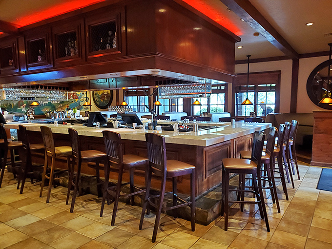 The bar isn't just stocked&mdash;it's a liquid library with wood accents and ambient lighting that makes everyone look like they're in a commercial.