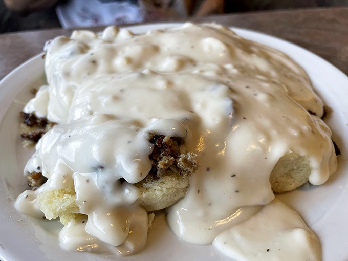Biscuits and gravy so good they could end family feuds. This isn't just breakfast; it's Southern diplomacy on a plate.