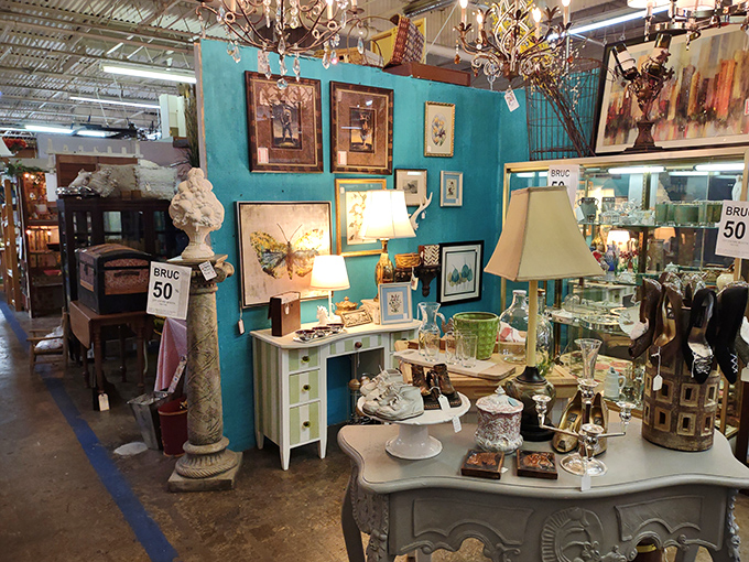 A teal-walled oasis showcasing how vintage pieces can create modern magic&mdash;interior designers take furious mental notes while browsing.