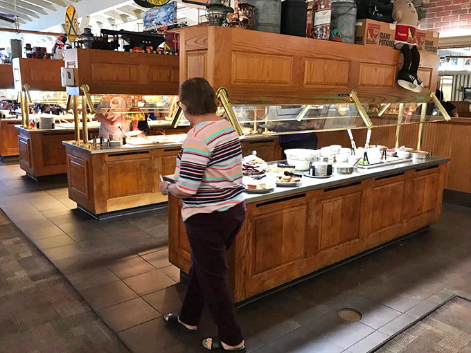 The buffet area isn't trying to be trendy; it's aiming for timeless. Wood paneling and practical design that puts food front and center.