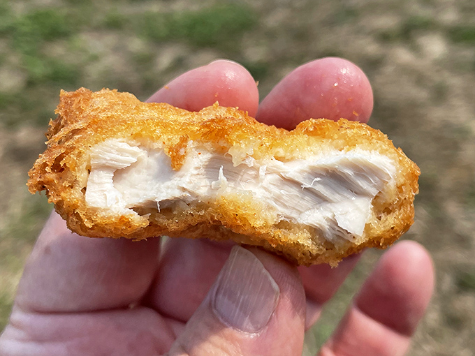 A close-up that tells the whole story&mdash;tender fish with a crispy exterior that shatters like delicate glass. Seafood perfection in one bite.