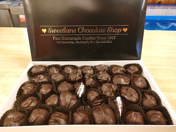 A box of chocolates is a promise kept &ndash; each brown beauty nestled in its paper cup like a precious artifact of happiness.