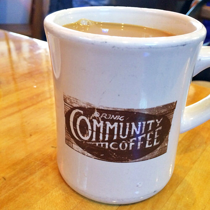 A mug of Community Coffee&mdash;the perfect companion to seafood indulgence. Simple pleasures in ceramic form.