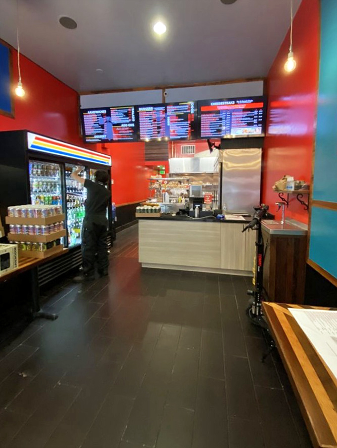 The open kitchen design lets you witness the cheesesteak magic happen. It's dinner and a show, minus the ticket price.