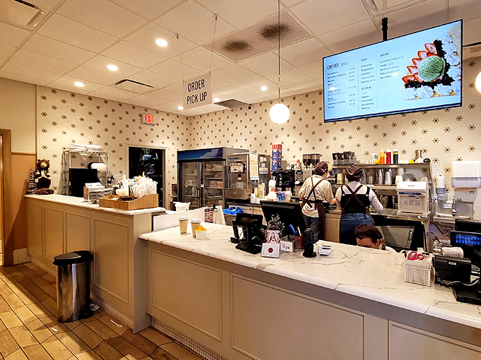 Behind this counter, culinary magic happens daily. It's like watching NASA engineers, except instead of rockets, they're launching flavor into orbit.