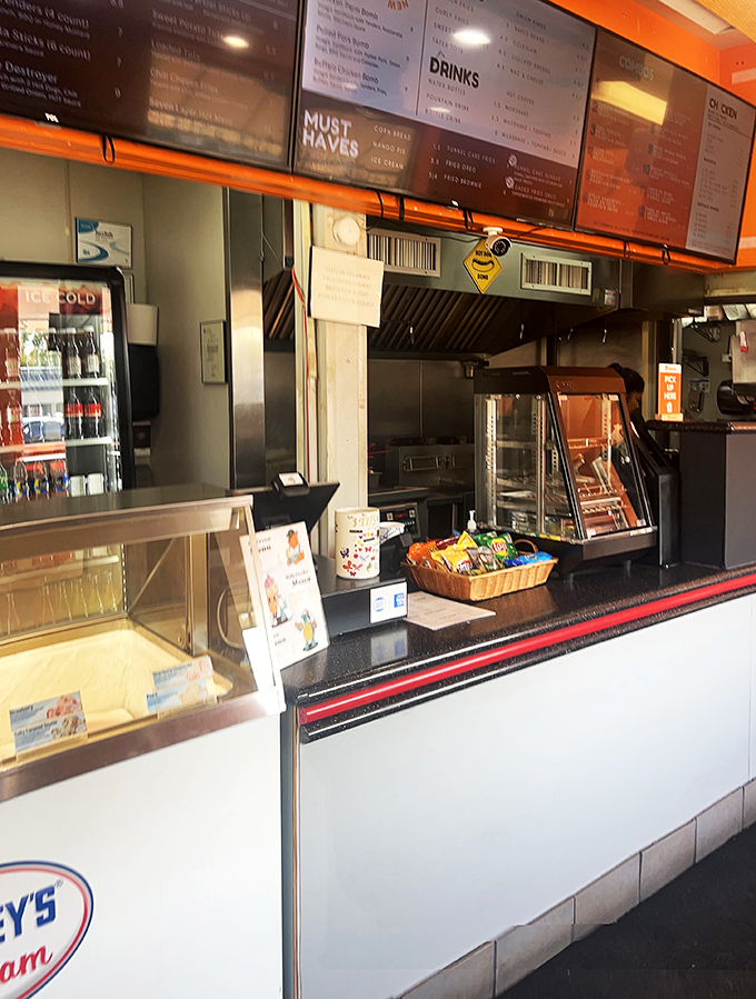 The ordering counter&mdash;that magical threshold where chicken dreams become crispy reality and diet plans go to die happily.