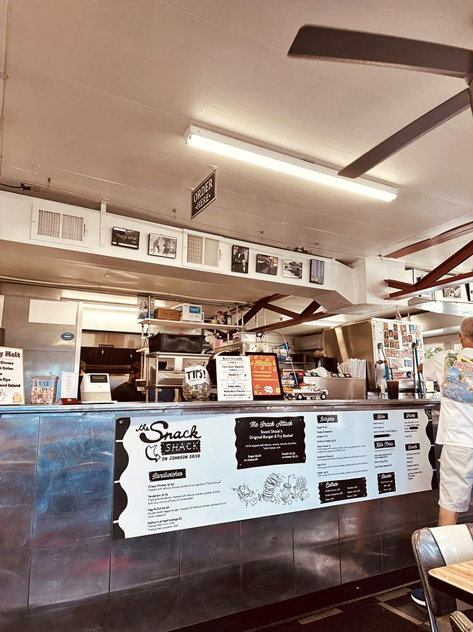 The order counter&mdash;where dreams are placed and fulfilled with equal measures of efficiency and burger-making artistry.