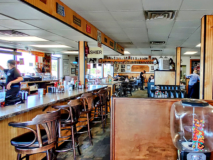 The counter seating—where solo diners become temporary family and servers perform their breakfast ballet with practiced precision.