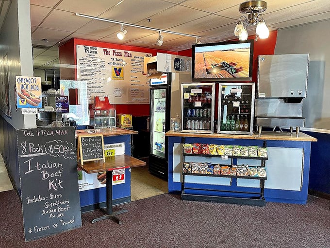 Behind this counter, Chicago dreams are assembled. The chalkboard offering "Italian Beef Kits" is the Midwest equivalent of a treasure map.
