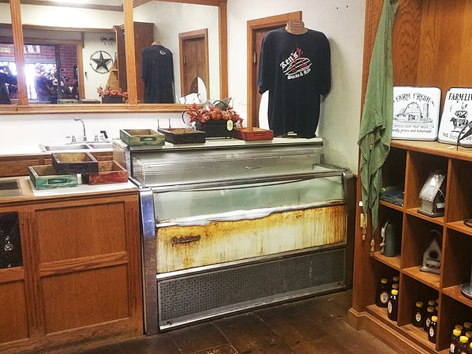 The salad bar setup area reveals the behind-the-scenes magic. That Ken's t-shirt isn't just merchandise&mdash;it's a badge of honor for Oklahoma beef lovers.