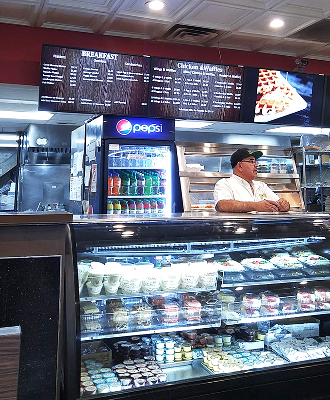 Behind that counter is where the magic happens. The dessert case alone is worth the trip—calories be damned.