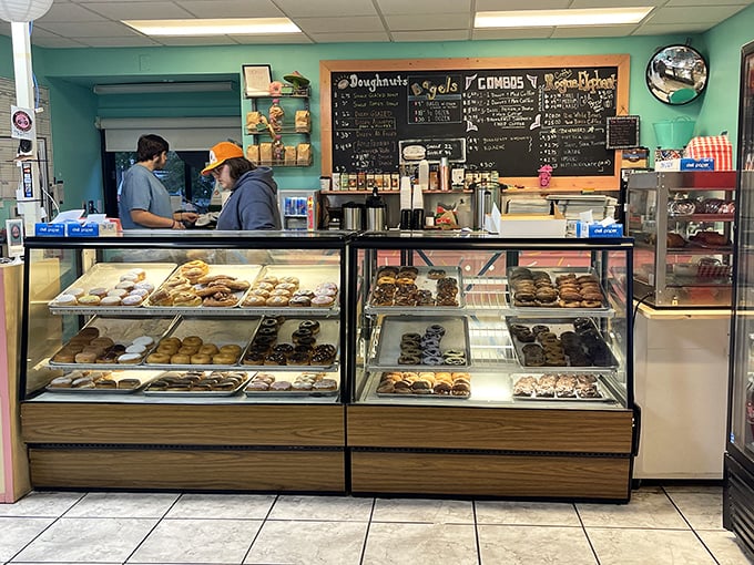 The display case: where dreams are stored at precisely the right temperature. Each shelf offers a different chapter in the story of your expanding waistline.