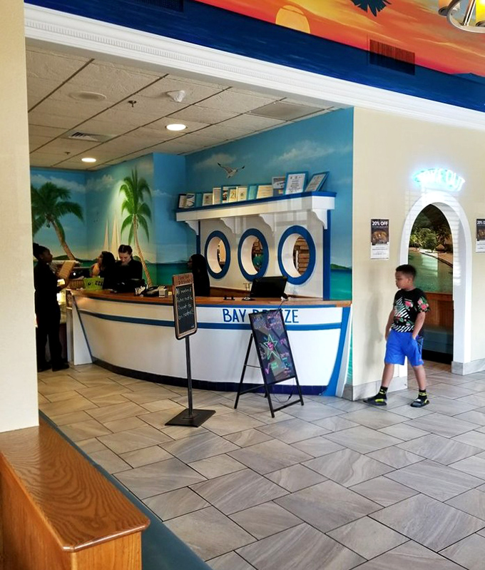 The boat-shaped counter&mdash;where first-timers become regulars and staff remember your order before you've fully settled into your seat.