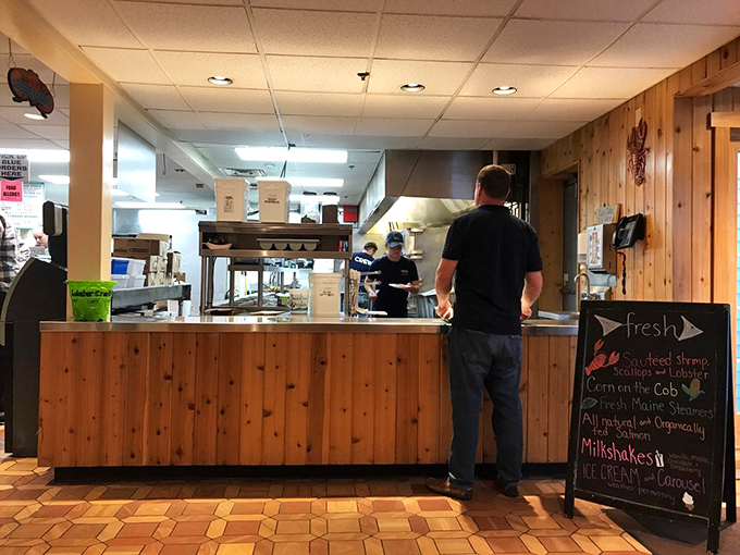 Where the magic happens&mdash;the counter service area lined with knotty pine paneling. Simple, efficient, and utterly Connecticut in the best possible way.