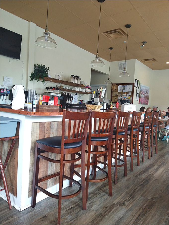 The counter seating: where solo diners become breakfast philosophers and the staff treats you like the regular you're about to become.