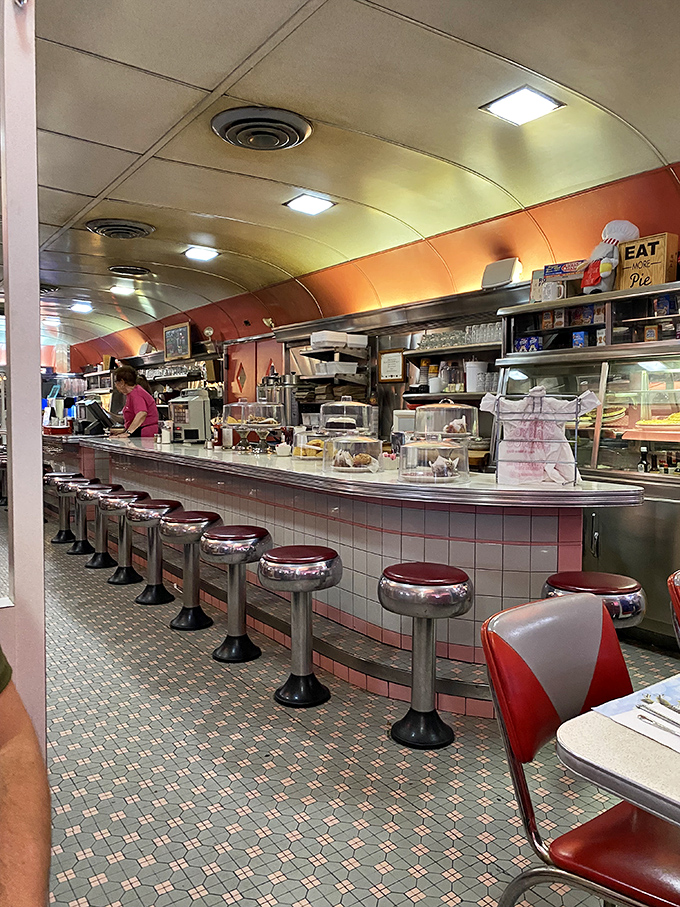 The counter seating area&mdash;where solo diners become regulars and servers know your order before you sit down. Classic Americana preserved in its natural habitat.