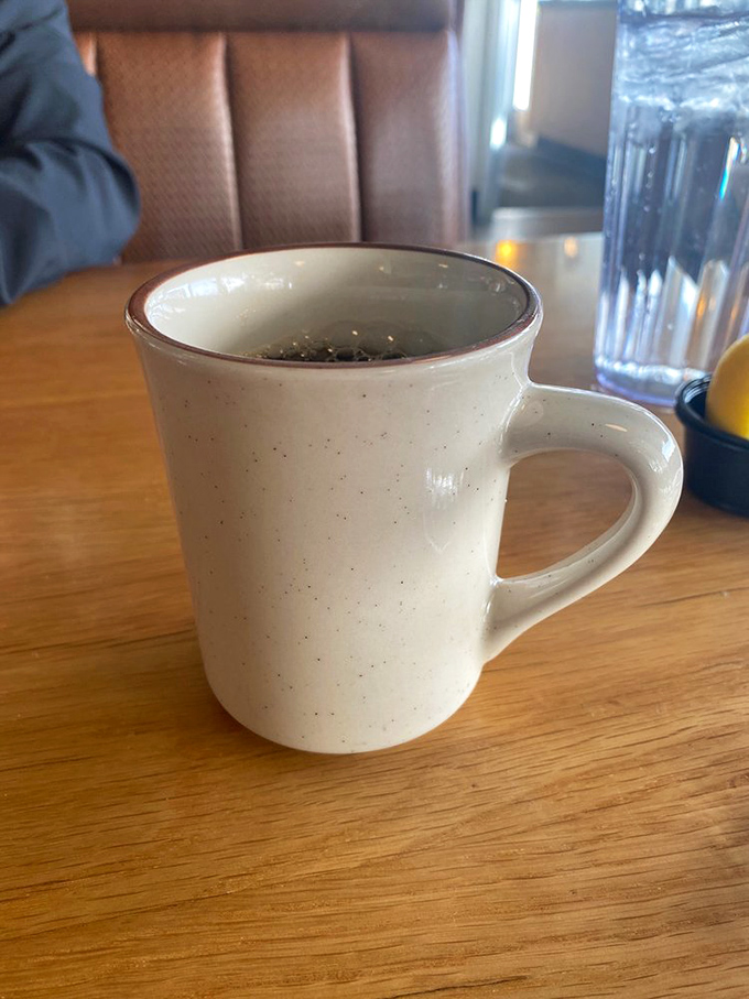 This isn't just coffee—it's a warm ceramic hug for your hands. The speckled mug says "take your time, we're not rushing you out."