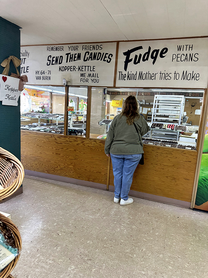 The universal posture of candy contemplation: shoulders forward, eyes scanning, mouth already anticipating that first perfect bite.