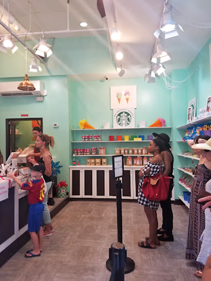 The line at Lucky's moves with the efficiency of a well-choreographed dance, as patrons eagerly await their turn at the turquoise temple of treats.