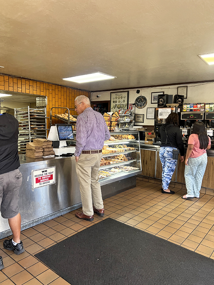 The morning pilgrimage&mdash;locals lining up for their fix of fried dough happiness, a ritual as essential as sunrise.