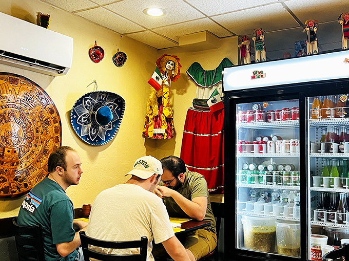 The traditional colorful d&eacute;cor watches over diners like cheerful guardians of authenticity. Some conversations need no translation.