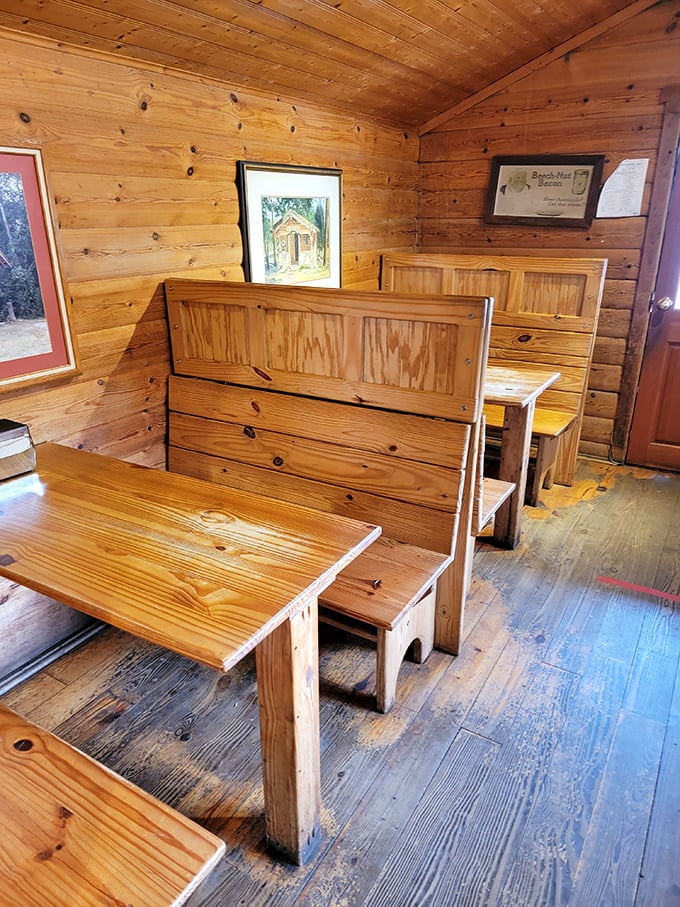 These wooden booths have heard more stories than a bartender on New Year's Eve. Simple, sturdy, and ready for your sandwich rendezvous.