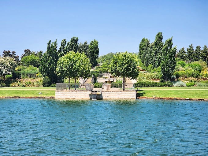 The garden meets the water in this serene lakeside setting, where the blues of sky and lake compete for which can appear more impossibly perfect.