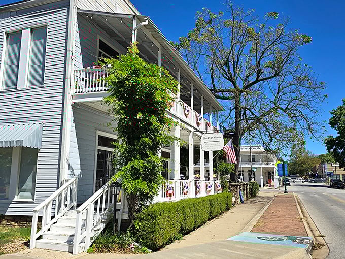 The white clapboard buildings and wraparound porches whisper stories of a different era, yet somehow feel perfectly at home in the present.