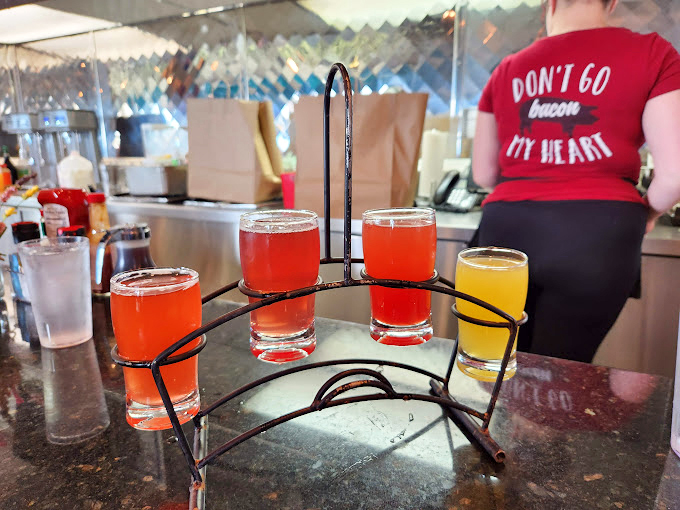 A flight of colorful drinks that proves breakfast cocktails aren't just for brunch snobs. The Moonlight knows sometimes vacation starts before the plane takes off.