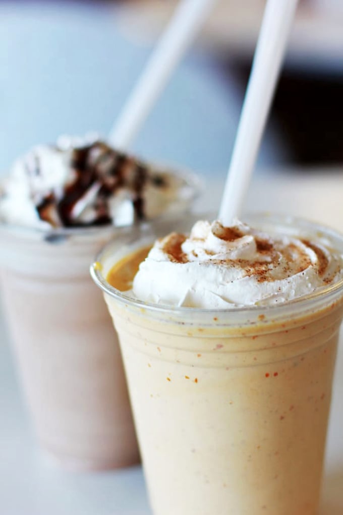 These aren't just milkshakes&mdash;they're dessert architecture, whipped cream skyscrapers atop foundations of creamy, cold perfection.