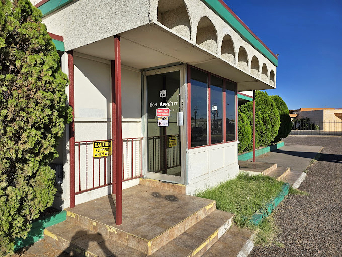"Bon Appetit" says the door, and they mean it. This entrance has welcomed generations of Phoenicians seeking comfort food and conversation.