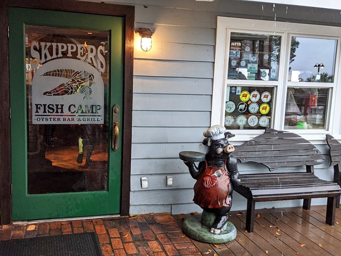 The entrance says it all: unpretentious, welcoming, and with a chef cow statue because... well, why not add a touch of whimsy?