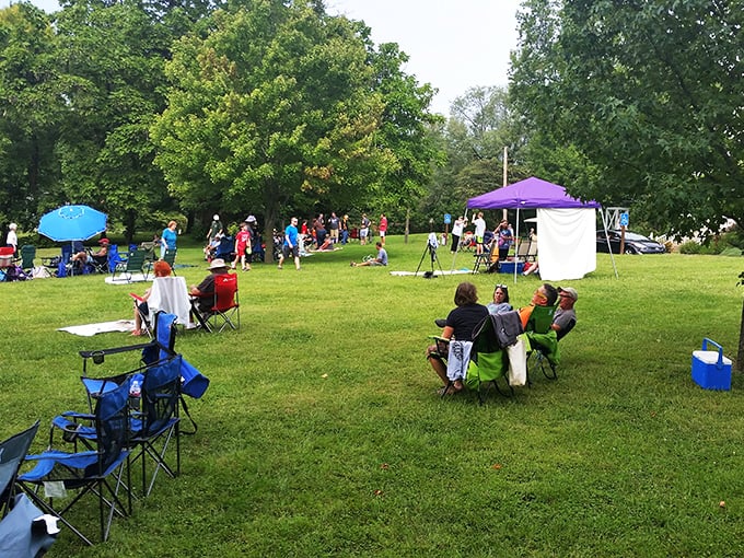 Green lawns become impromptu gathering spaces where strangers become neighbors faster than you can say "pass the lemonade."