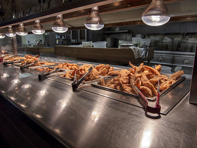 The buffet's greatest hits album: golden catfish, hushpuppies, and a salad that's mostly there to make you feel better about going back for thirds.