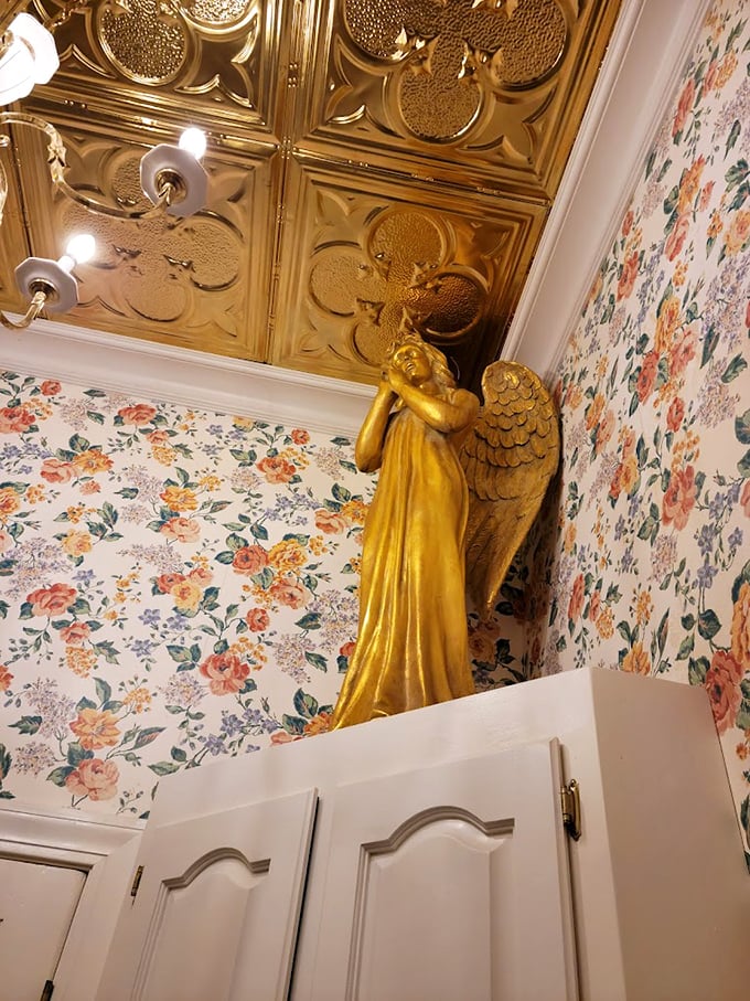 Even the smallest details reflect grandeur&mdash;this golden angel figurine stands watch beneath an ornate ceiling that would make Michelangelo nod in approval.