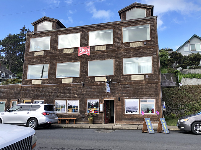 A building that's seen more coastal weather than a lighthouse keeper. Those windows have witnessed countless storms and sunsets.