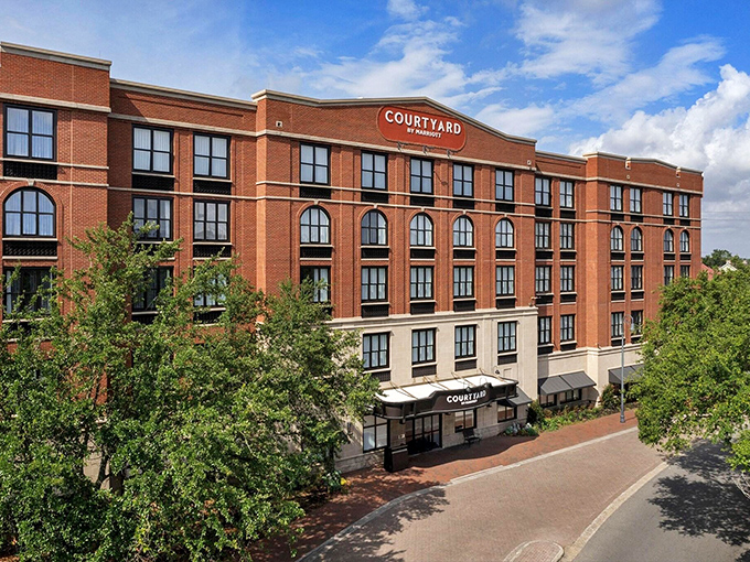 The Courtyard Marriott cleverly disguises itself in historic brick, like a modern hotel playing dress-up in Savannah's architectural costume party.