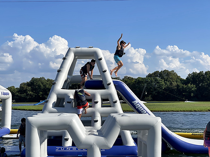 Mid-air freedom! That magical moment between leaving the slide and meeting the water is pure, unfiltered joy at any age.