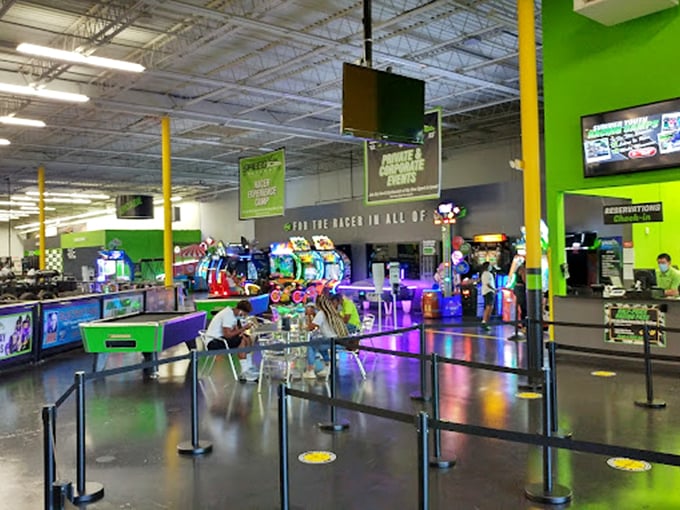 The arcade area—because sometimes you need to catch your breath between showing your friends who's boss on the actual track.