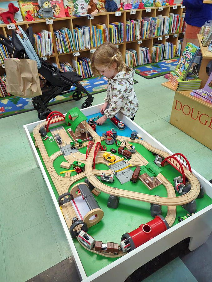 The train table: where parents earn precious browsing minutes while young engineers conduct important business. A win-win negotiation.