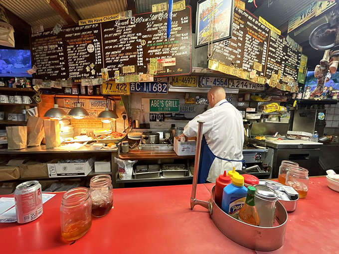 That red counter is the stage, and the kitchen is where the magic happens. Broadway has nothing on this daily performance.